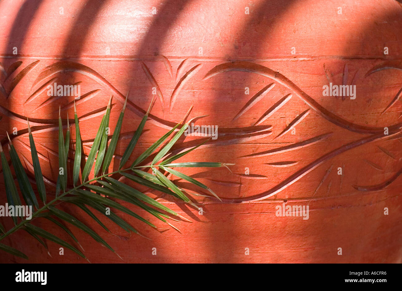 Leaf and Shadows on Clay Pot Stock Photo - Alamy