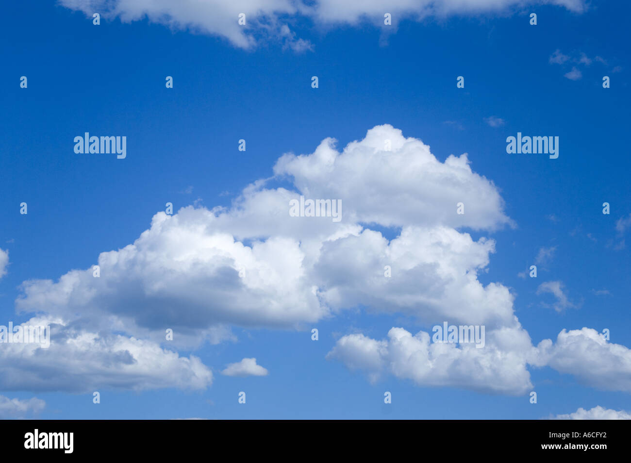 Fluffy White Clouds in Blue Sky Stock Photo - Alamy