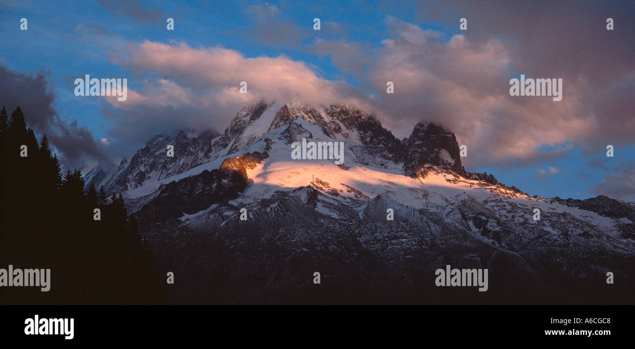 Sunset colours on Les Drus peak in the French Alps above Chamonix Stock ...