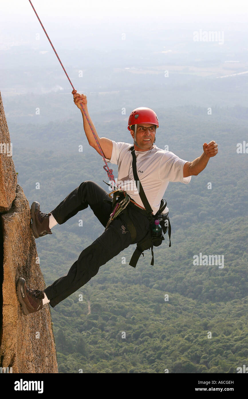 a man climbing Stock Photo - Alamy