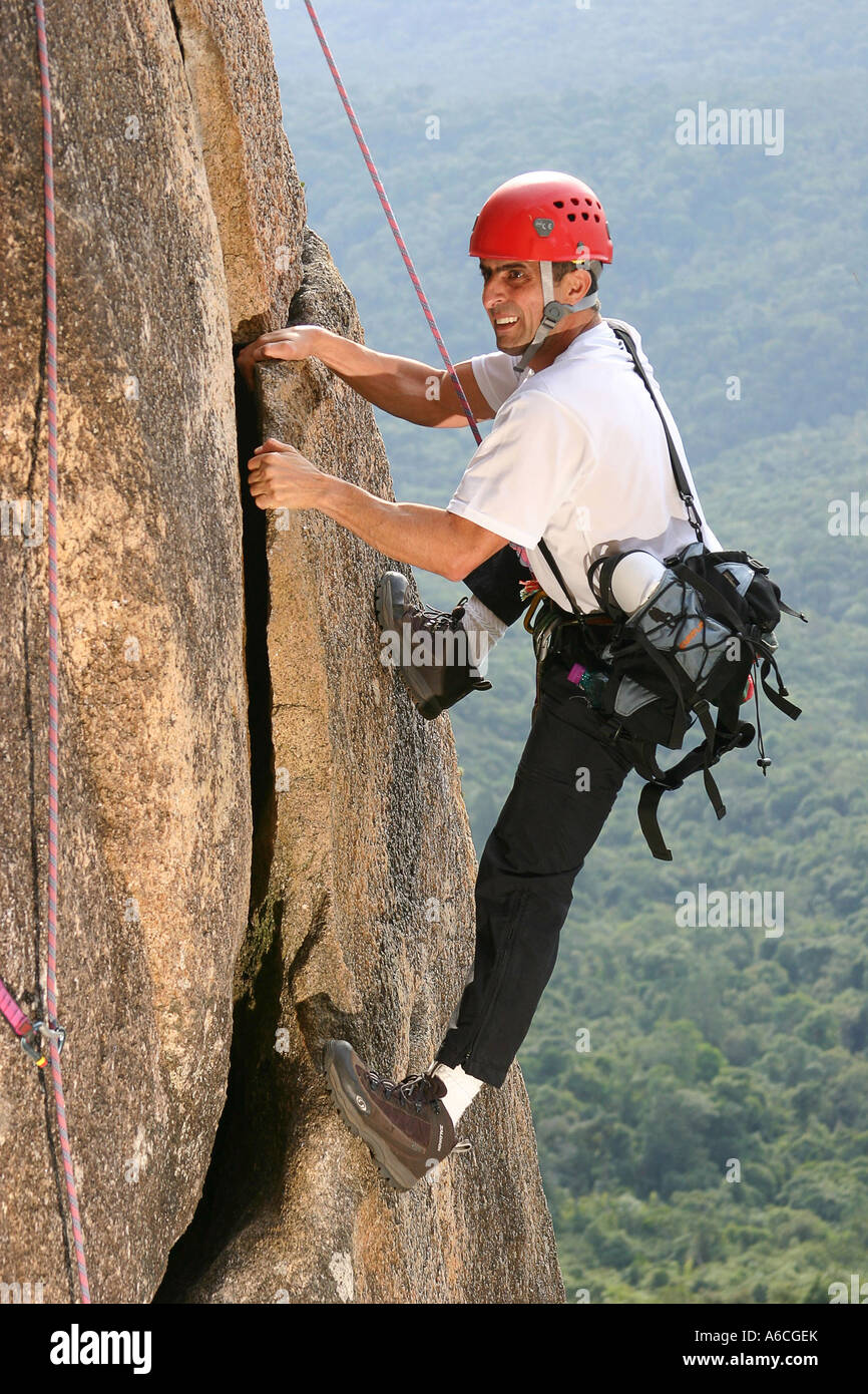 a man climbing Stock Photo - Alamy