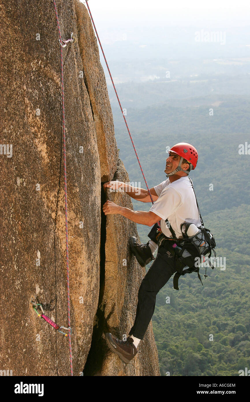 a man climbing Stock Photo - Alamy