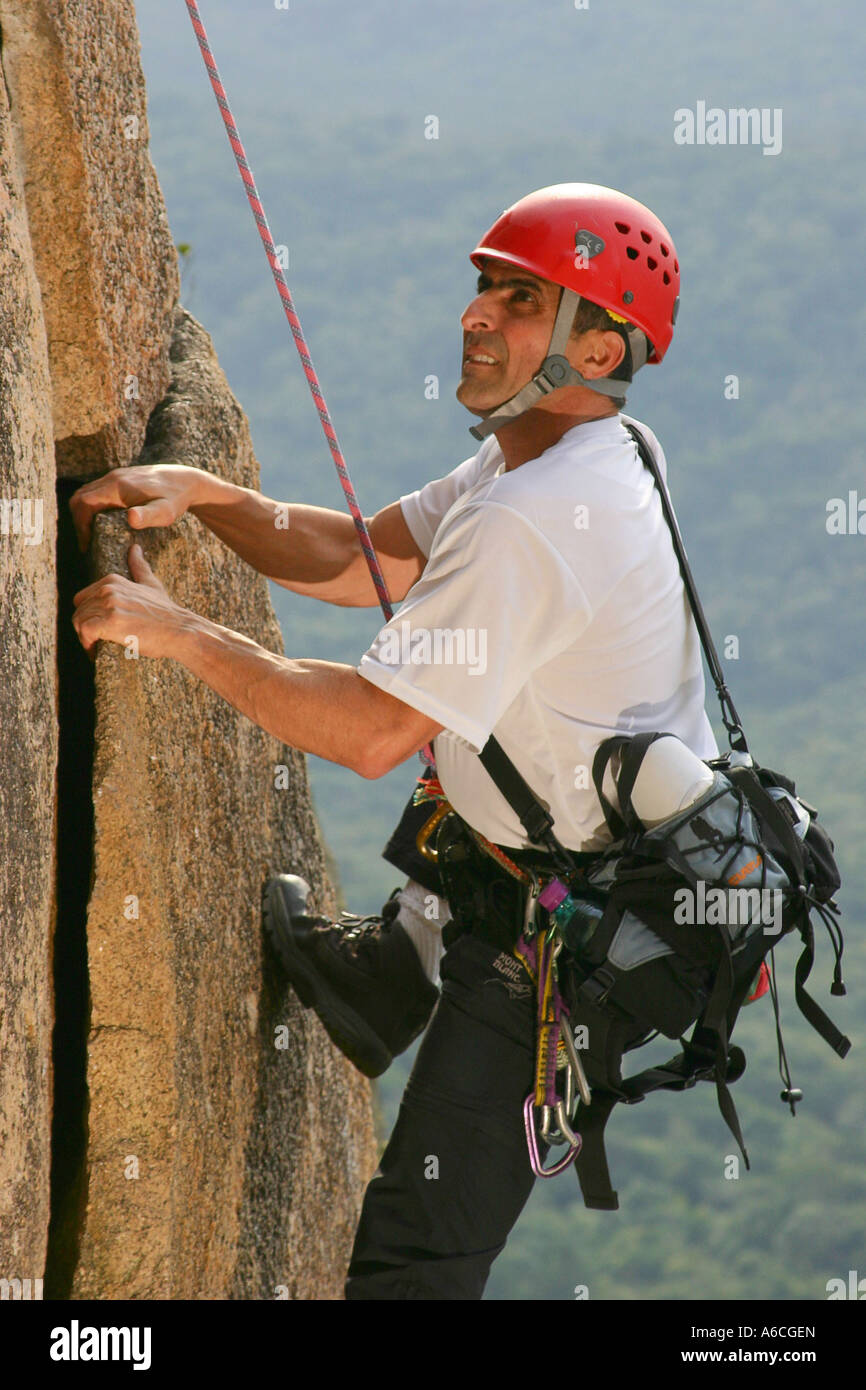 a man climbing Stock Photo - Alamy