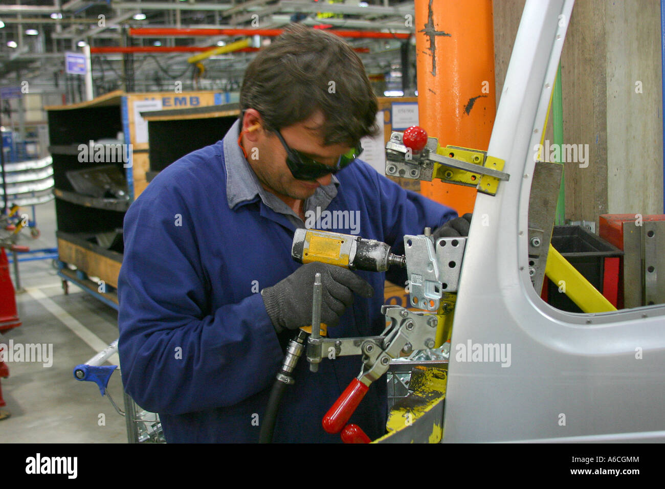 Blind worker at Truck factory -Volvo - Brazil Stock Photo - Alamy