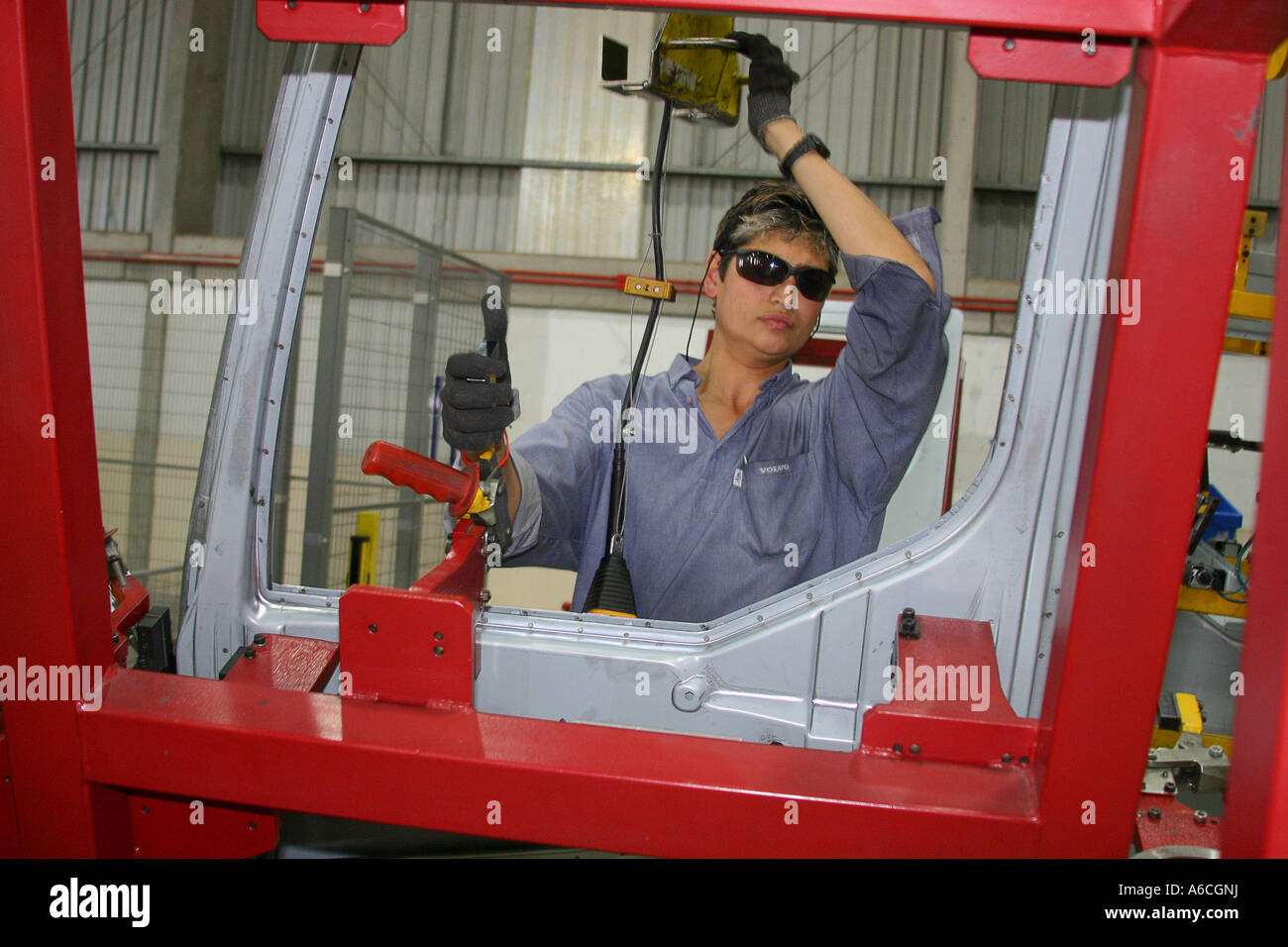 Blind worker at Truck factory -Volvo - Brazil Stock Photo - Alamy