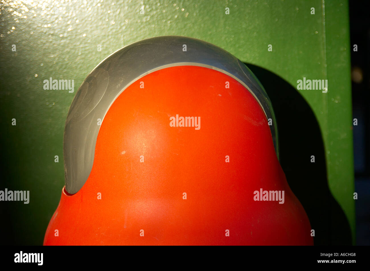 Red litter on a green wall Stock Photo - Alamy