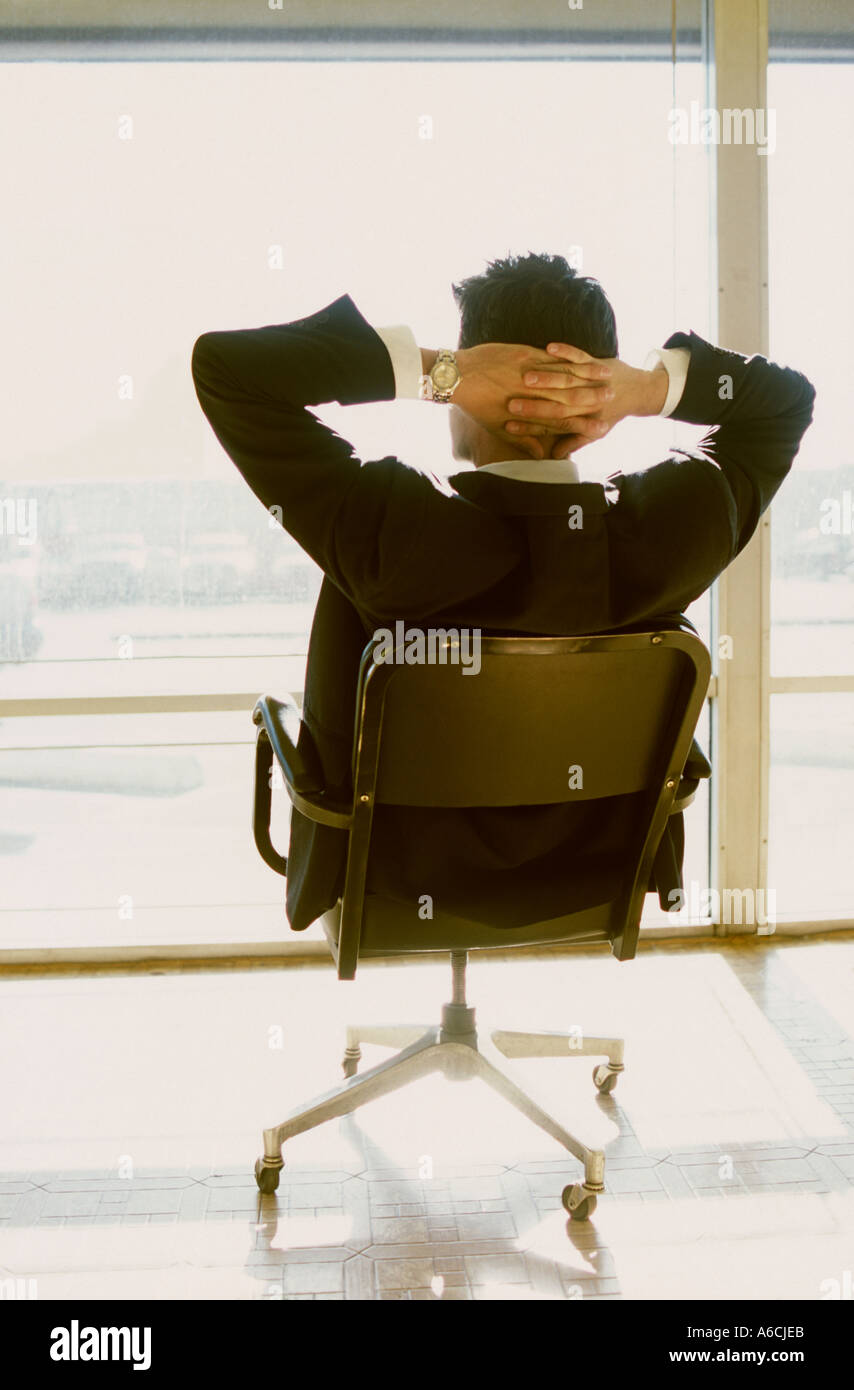 Man on swivel chair hi-res stock photography and images - Alamy