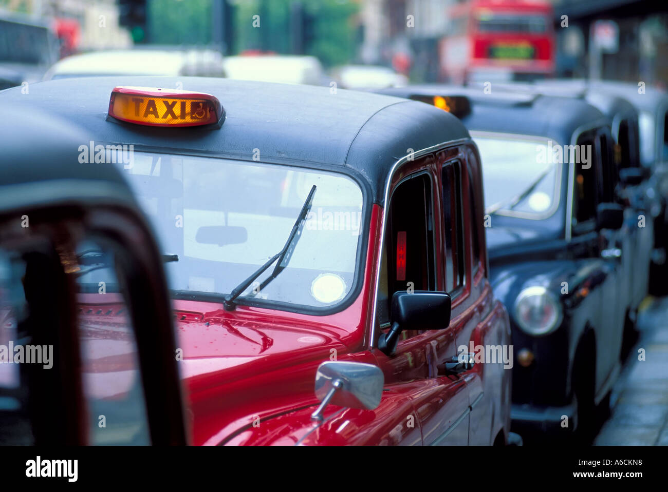 London cabs parked, red cab highlighted, London England Stock Photo - Alamy