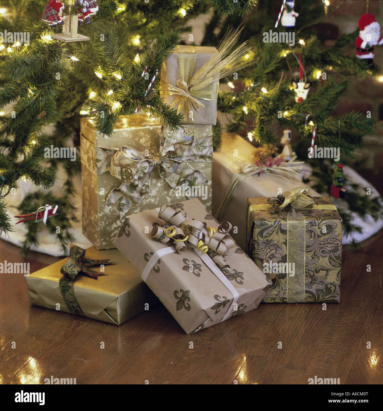 Christmas presents under a Christmas tree Stock Photo - Alamy