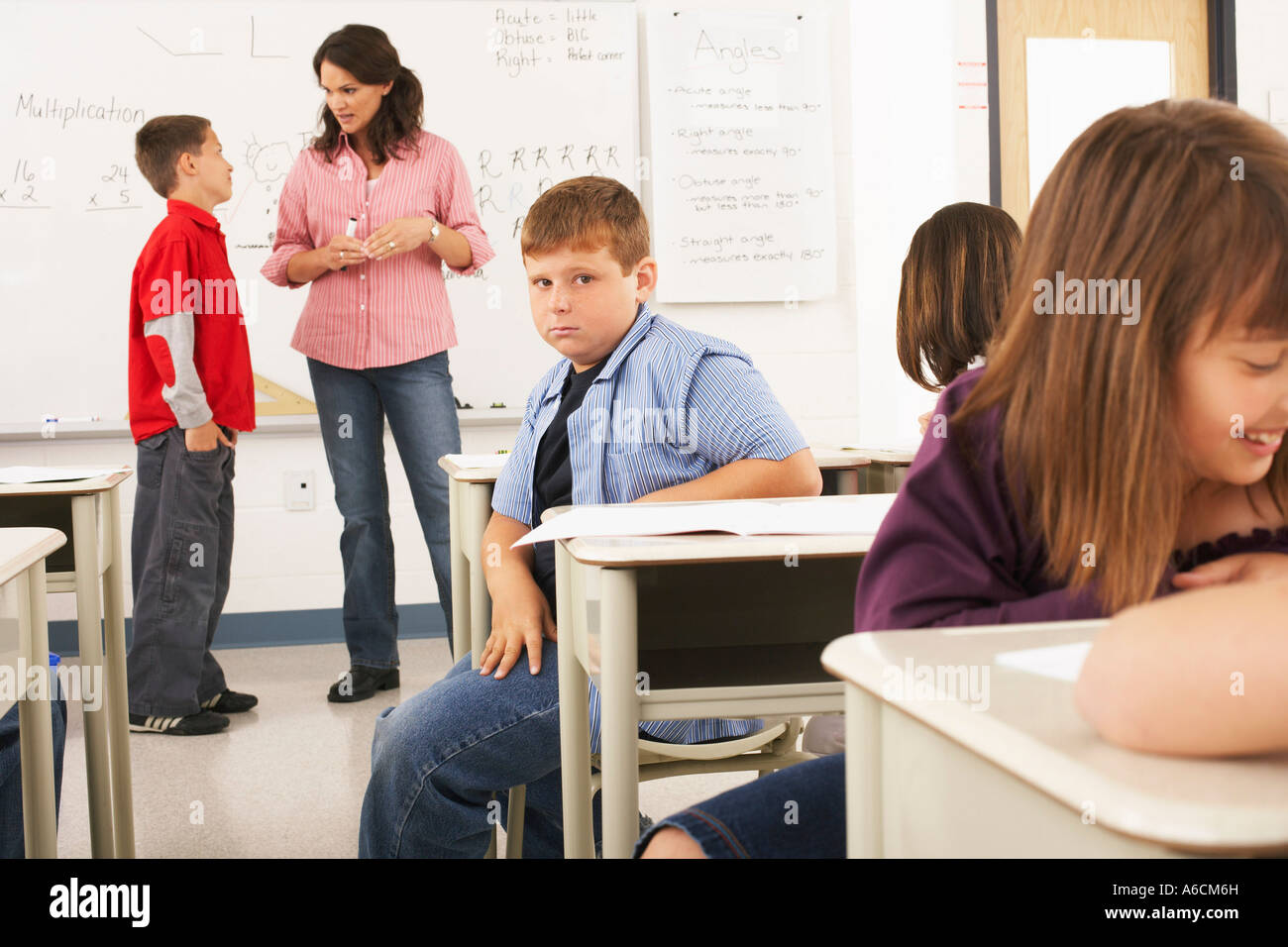 Child speaking in front of class hi-res stock photography and images ...