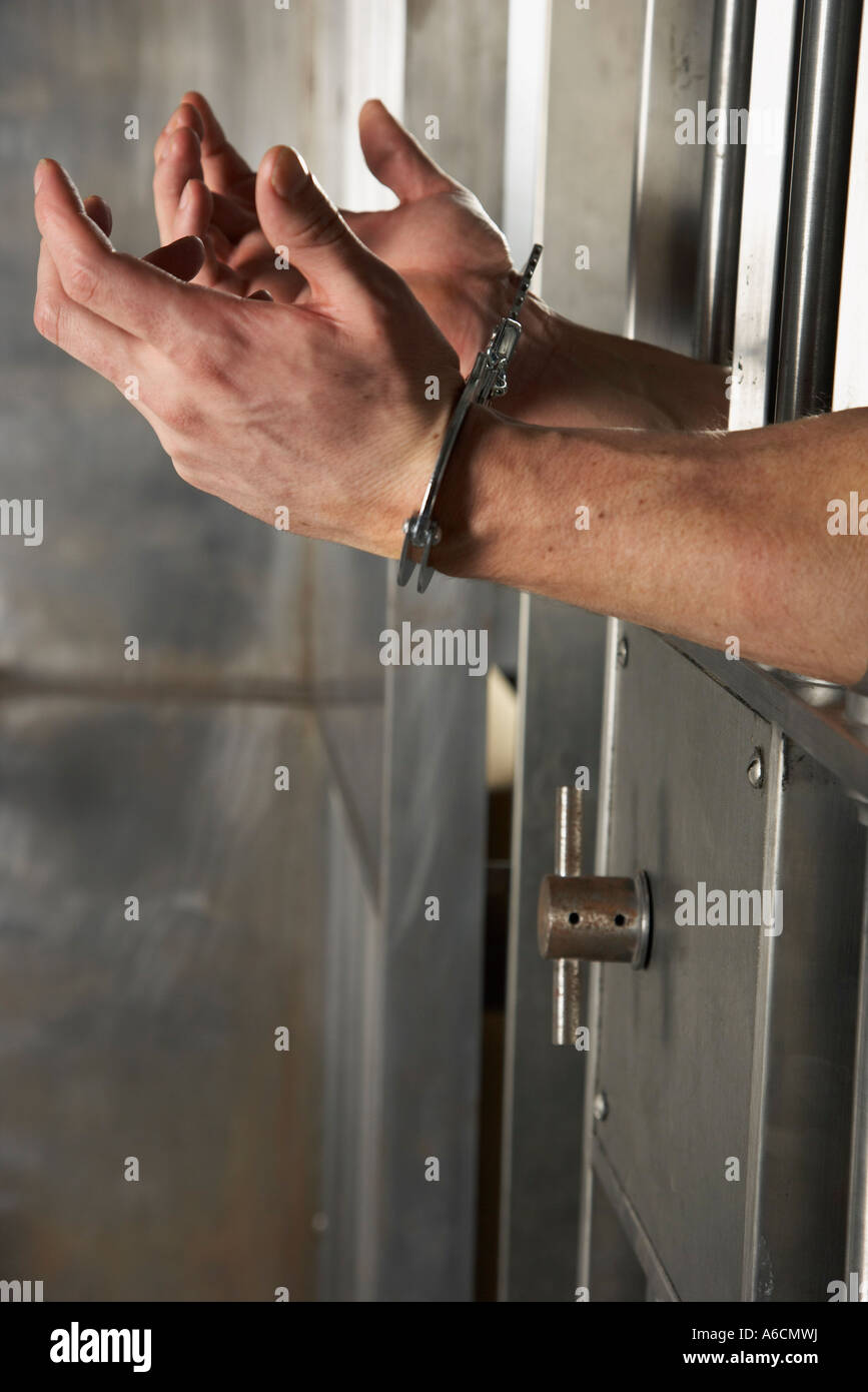 Handcuff man jail hi-res stock photography and images - Alamy