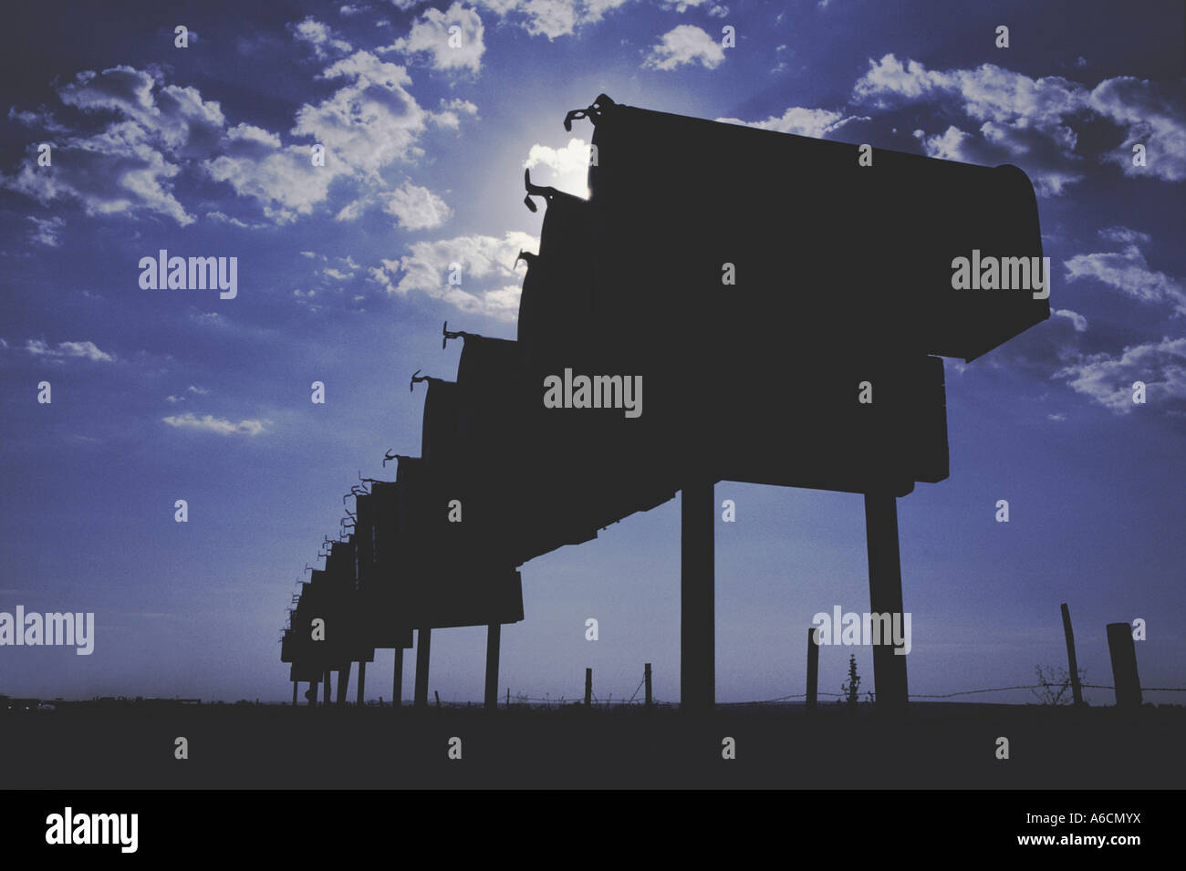 Silhouette of mailboxes in a row Stock Photo - Alamy