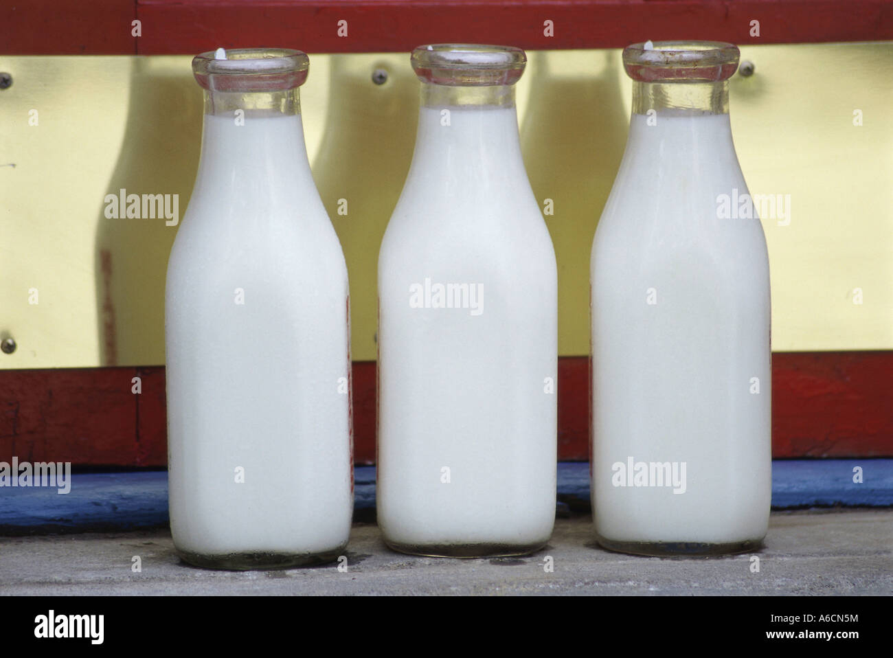 Three bottles of milk Stock Photo - Alamy
