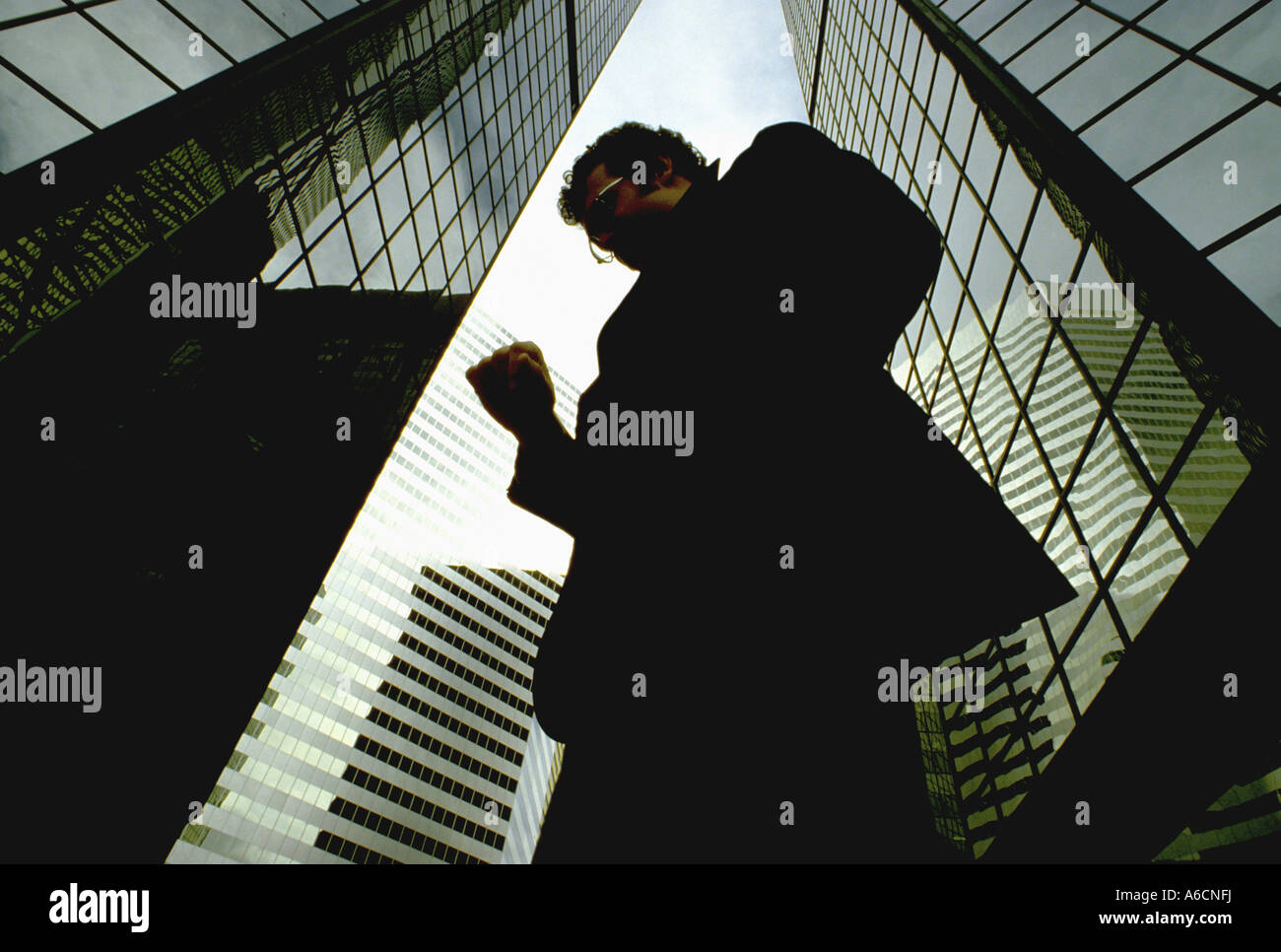 Low angle view of a businessman looking at his wristwatch Stock Photo ...