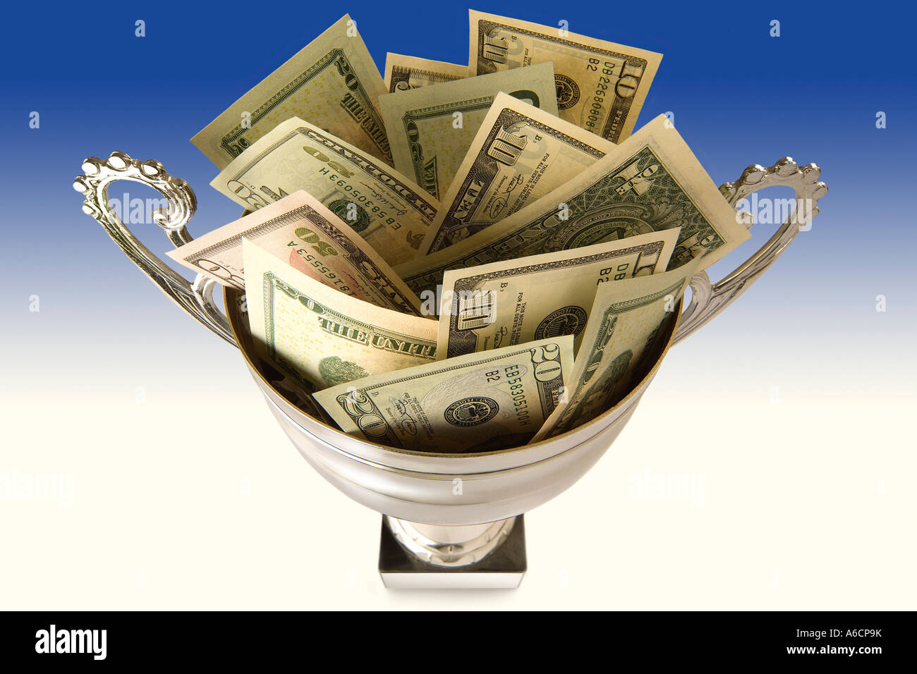 Trophy with Money Stock Photo - Alamy