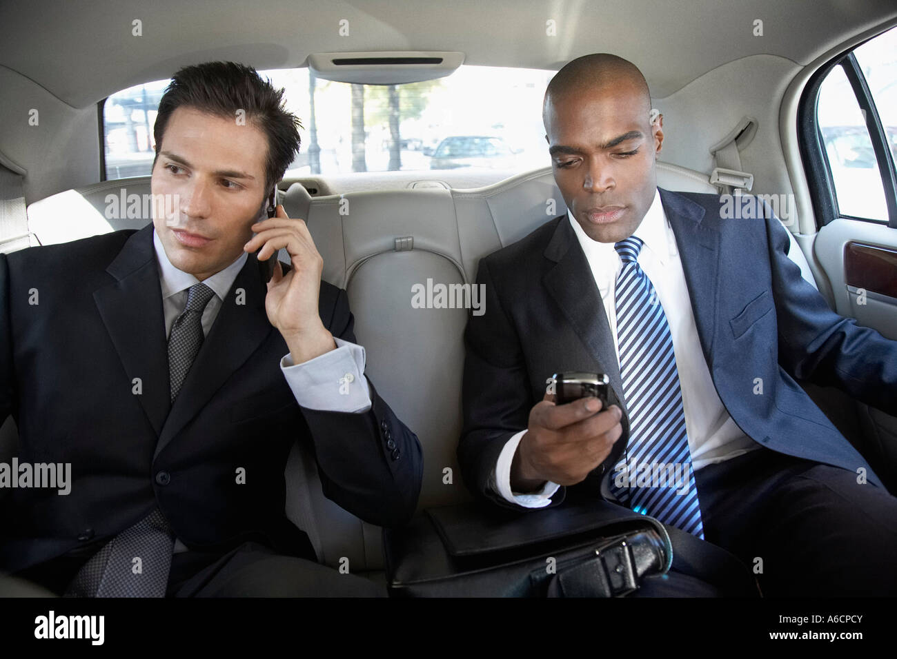 Businessmen in Car Stock Photo - Alamy