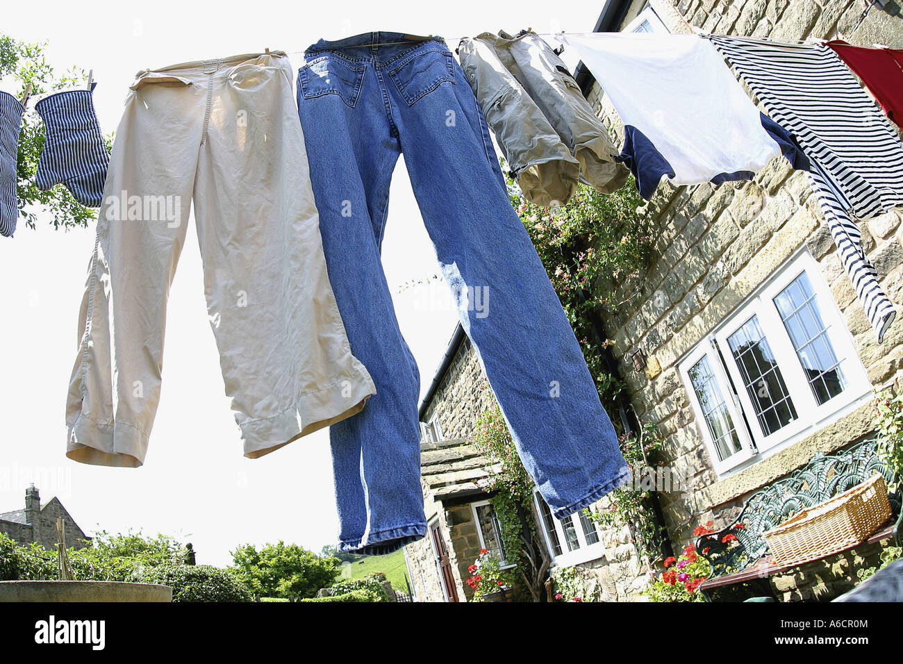 Low angle view of clothes drying on a clothes line Stock Photo - Alamy