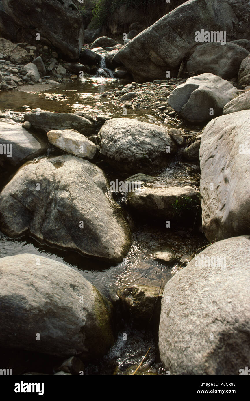 Pakistan Swat Valley Saidu Sharif mountain stream flowing between rocks ...