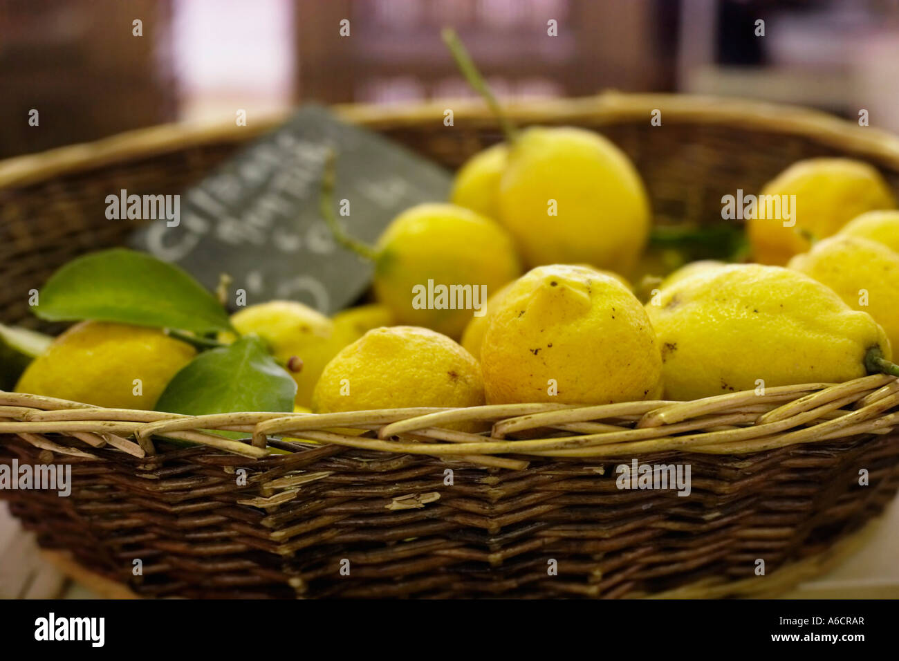 Basket of Lemons Stock Photo - Alamy