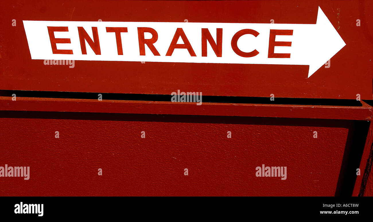 Painted entrance arrow Stock Photo - Alamy