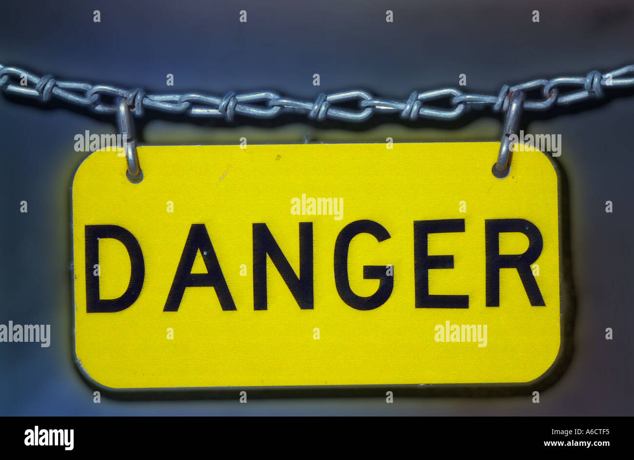 DANGER sign hanging from chain Artistic rendering Stock Photo - Alamy