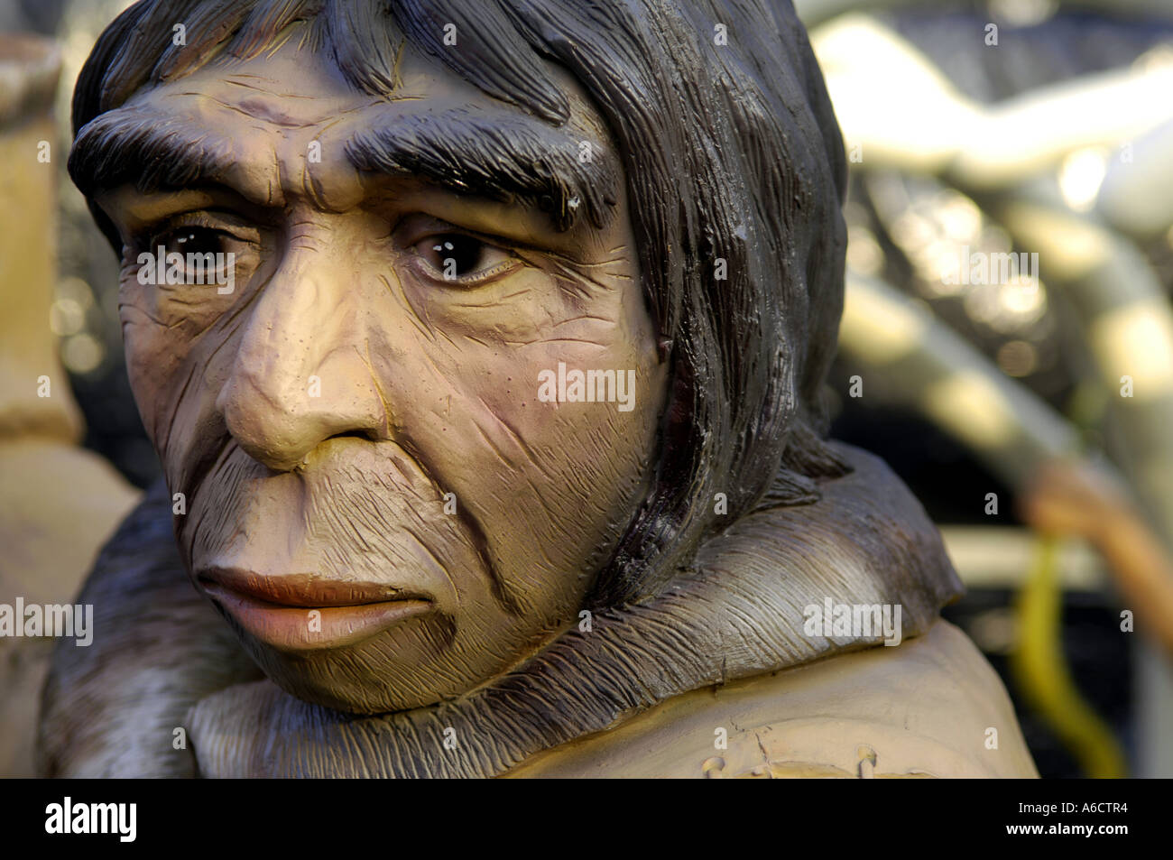 prehistoric head face large brown eye man male human humanoid ...
