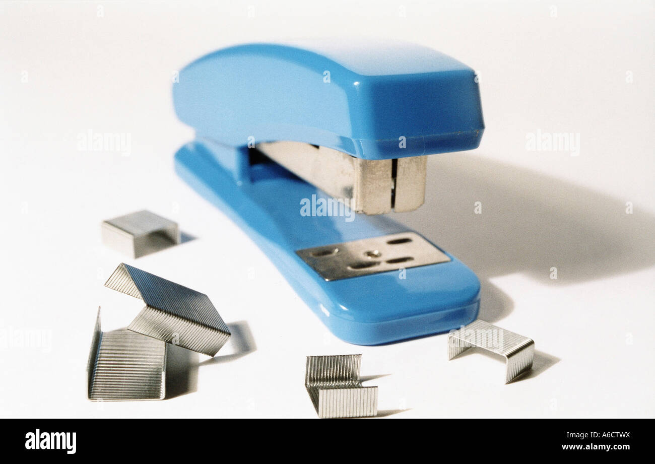 Close-up of a stapler and staples Stock Photo - Alamy