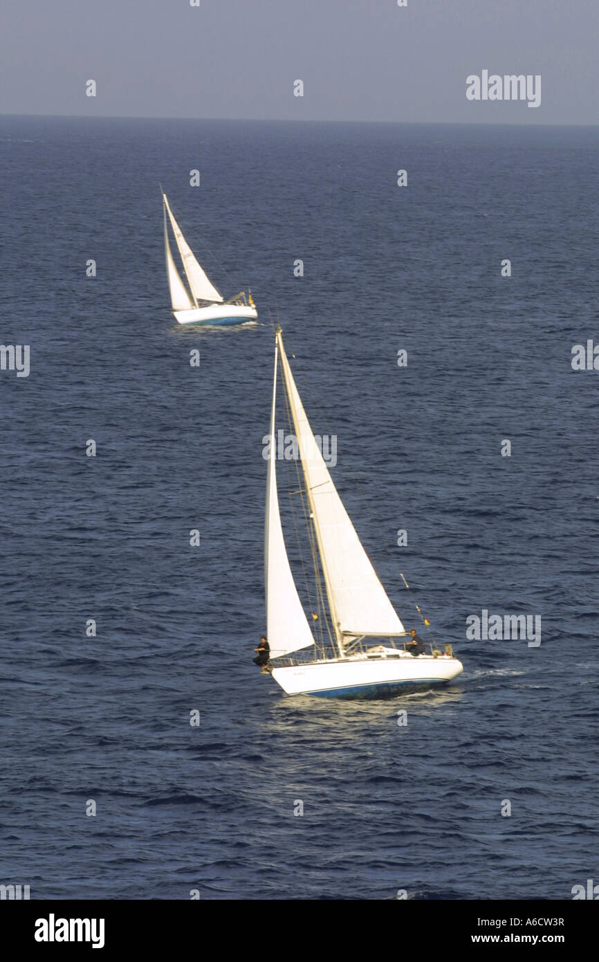 Two sailboats in the sea Stock Photo - Alamy