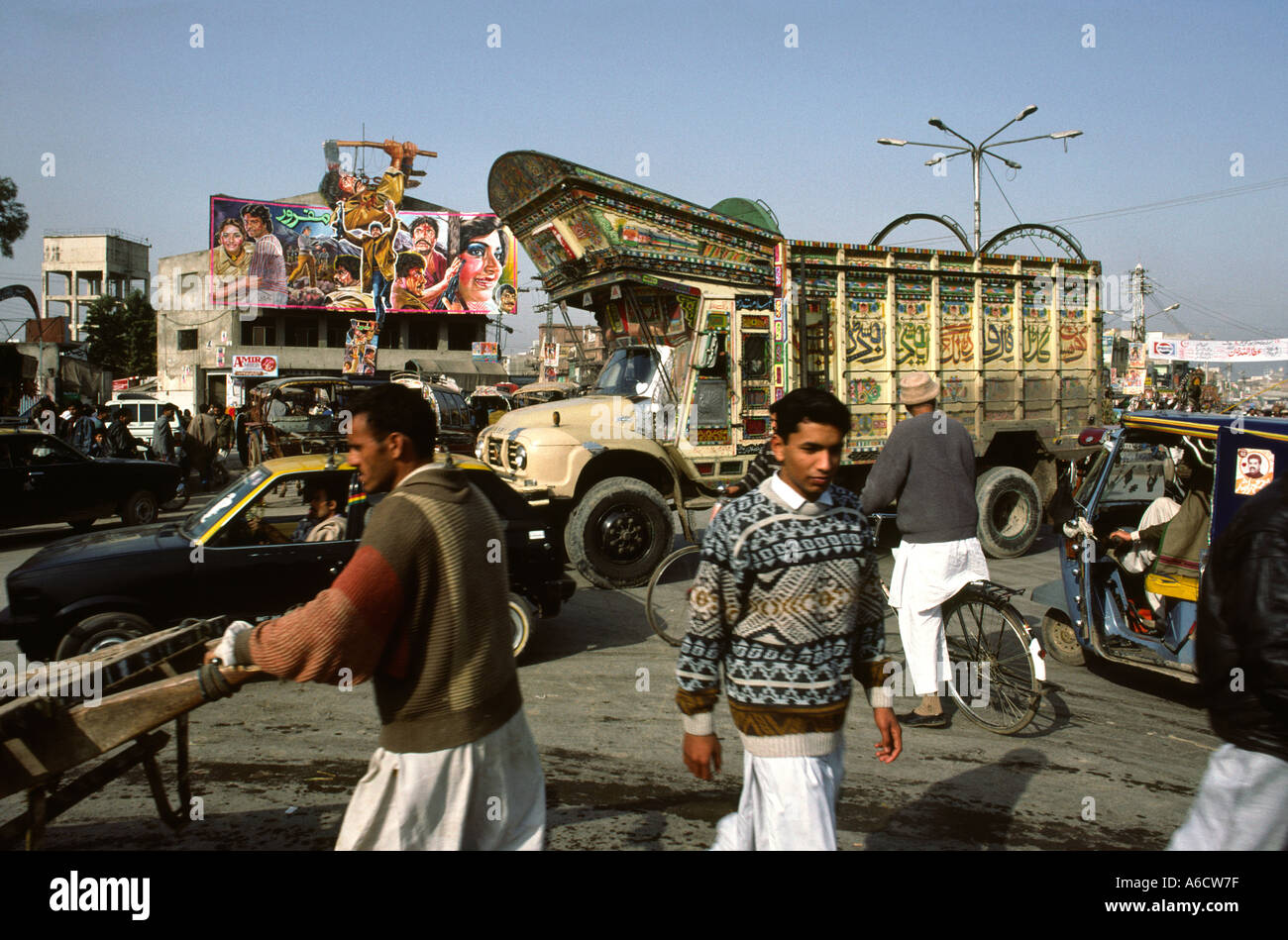 Pakistan Rawalpindi Rajah Bazaar street scene with decorated truck ...