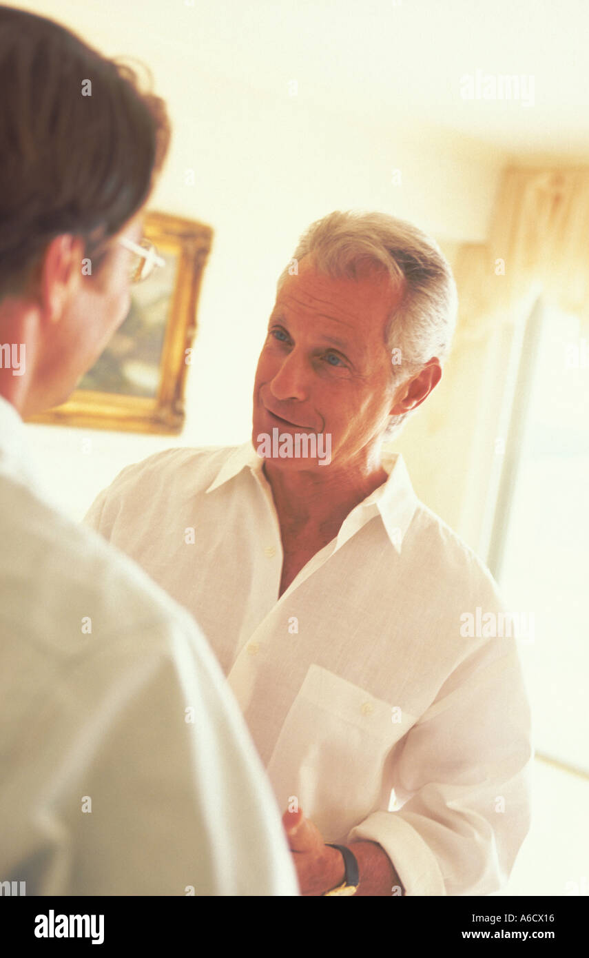 portrait of two men talking Stock Photo - Alamy
