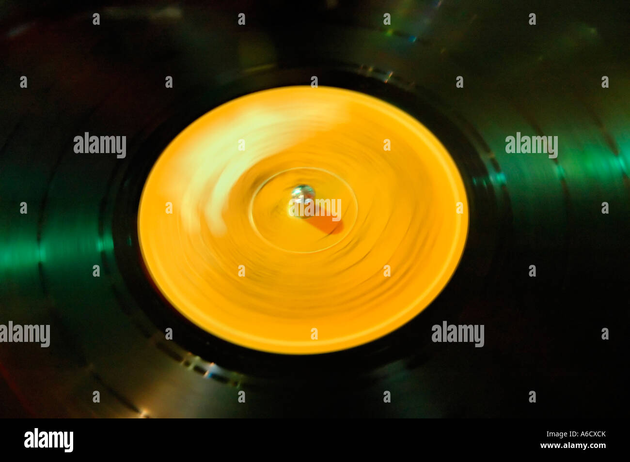 spinning records on a deck or record player used to play at discos ...