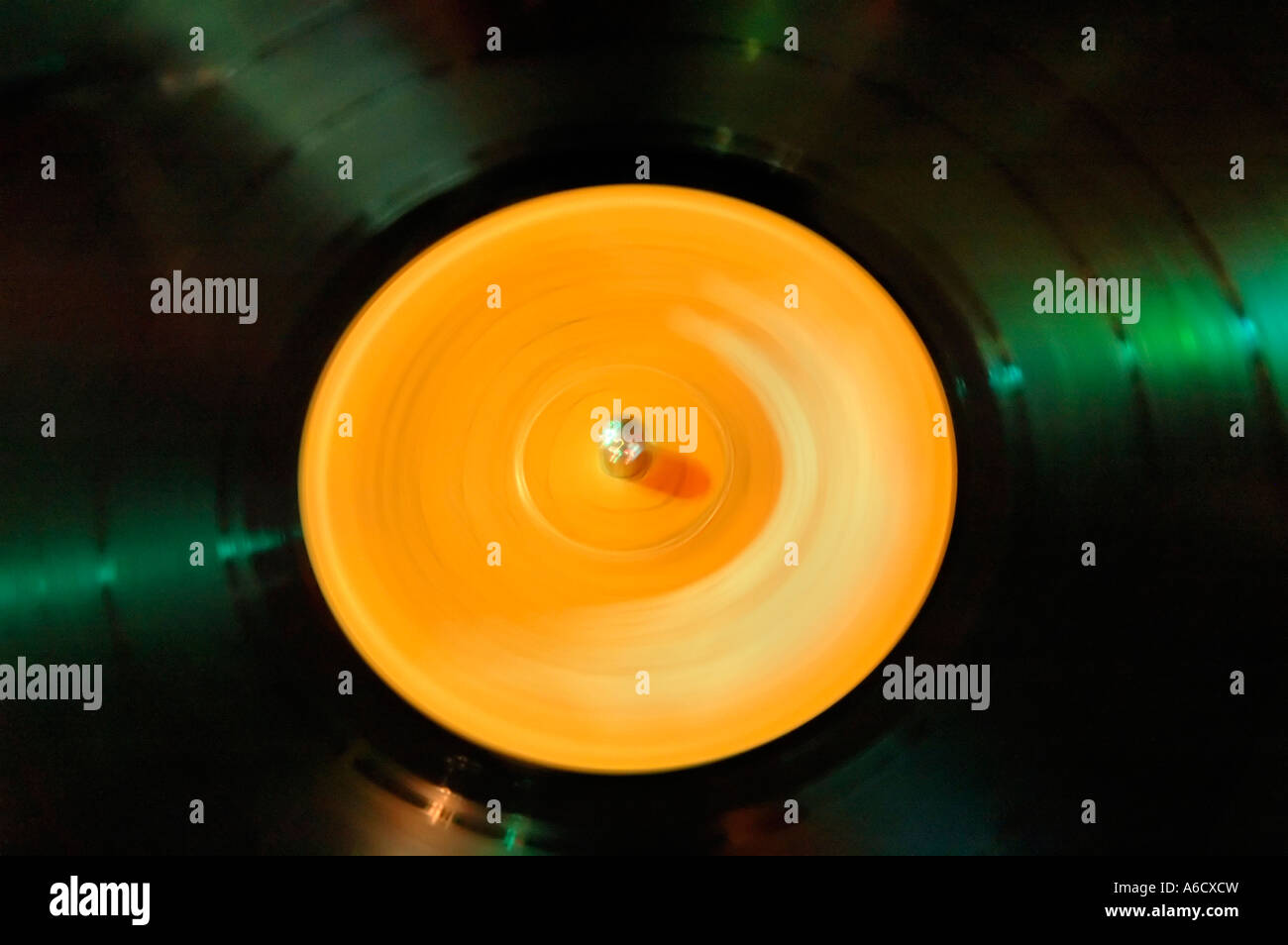 spinning records on a deck or record player used to play at discos ...