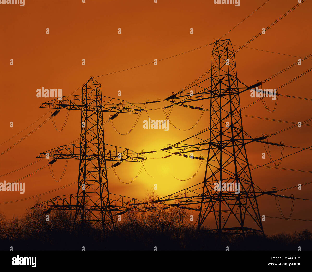 Electricity pylon during sunset, Scotland Stock Photo - Alamy