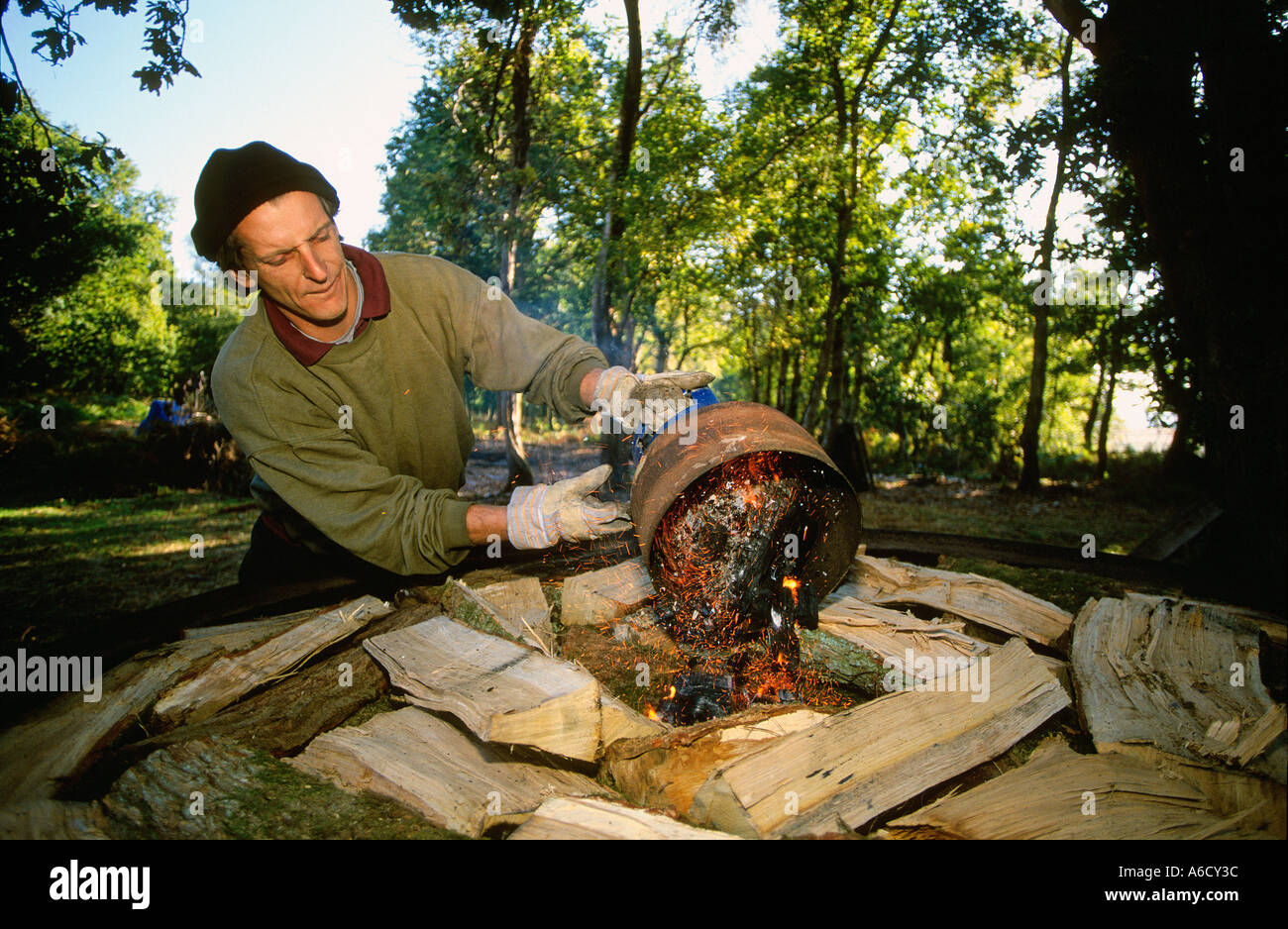 Traditional charcoal maker in coppiced woodland Dorset UK Stock Photo ...