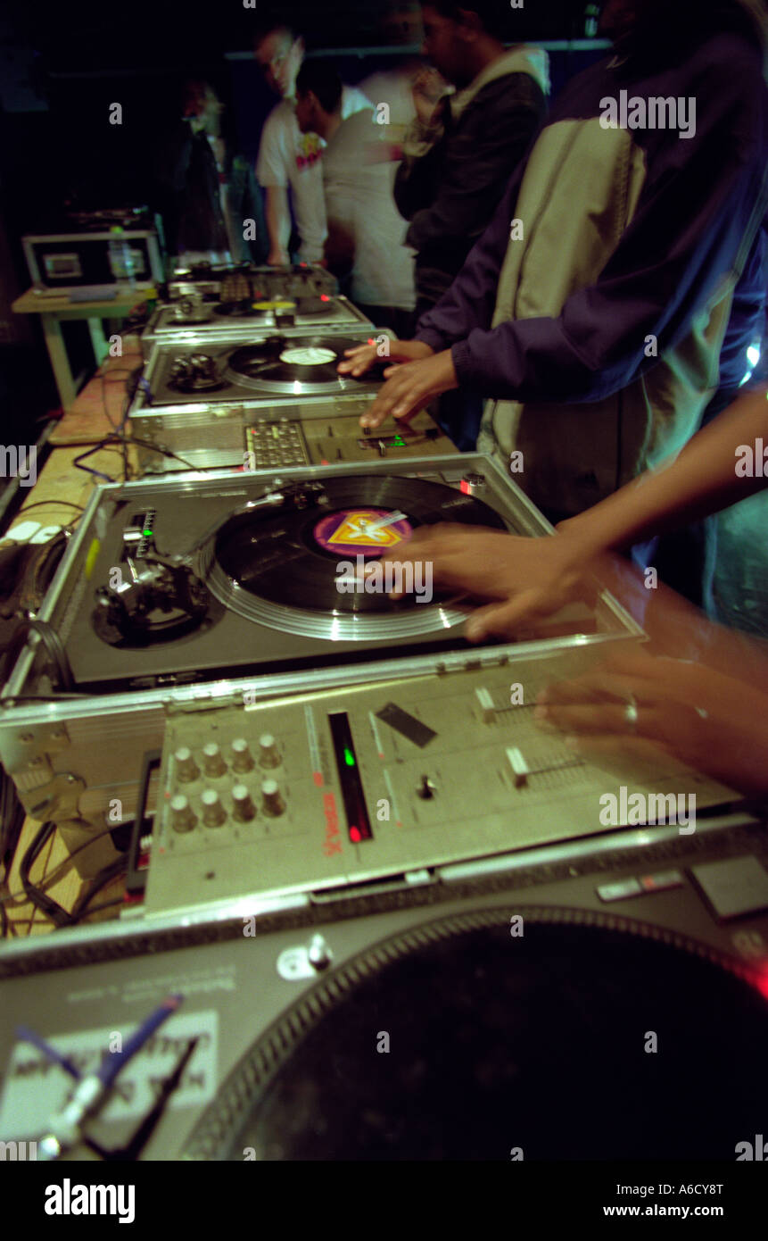 djs hands scratching and playing records playing everything from garage ...