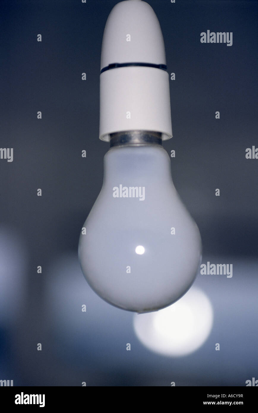 A single light bulb unlit hanging down in a house Stock Photo - Alamy