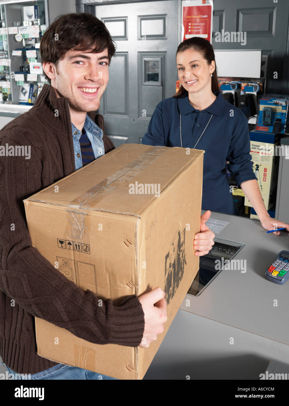 Two men carry woman look hi-res stock photography and images - Alamy