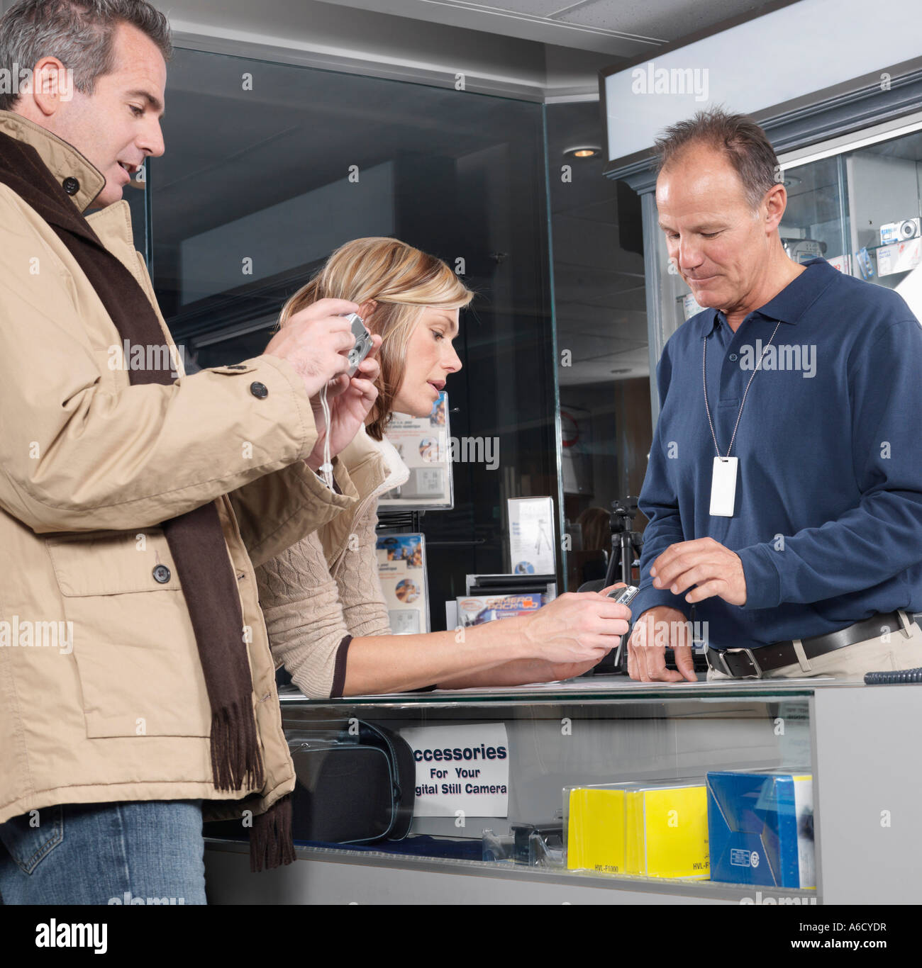 Camera sales customer shop assisting hi-res stock photography and ...