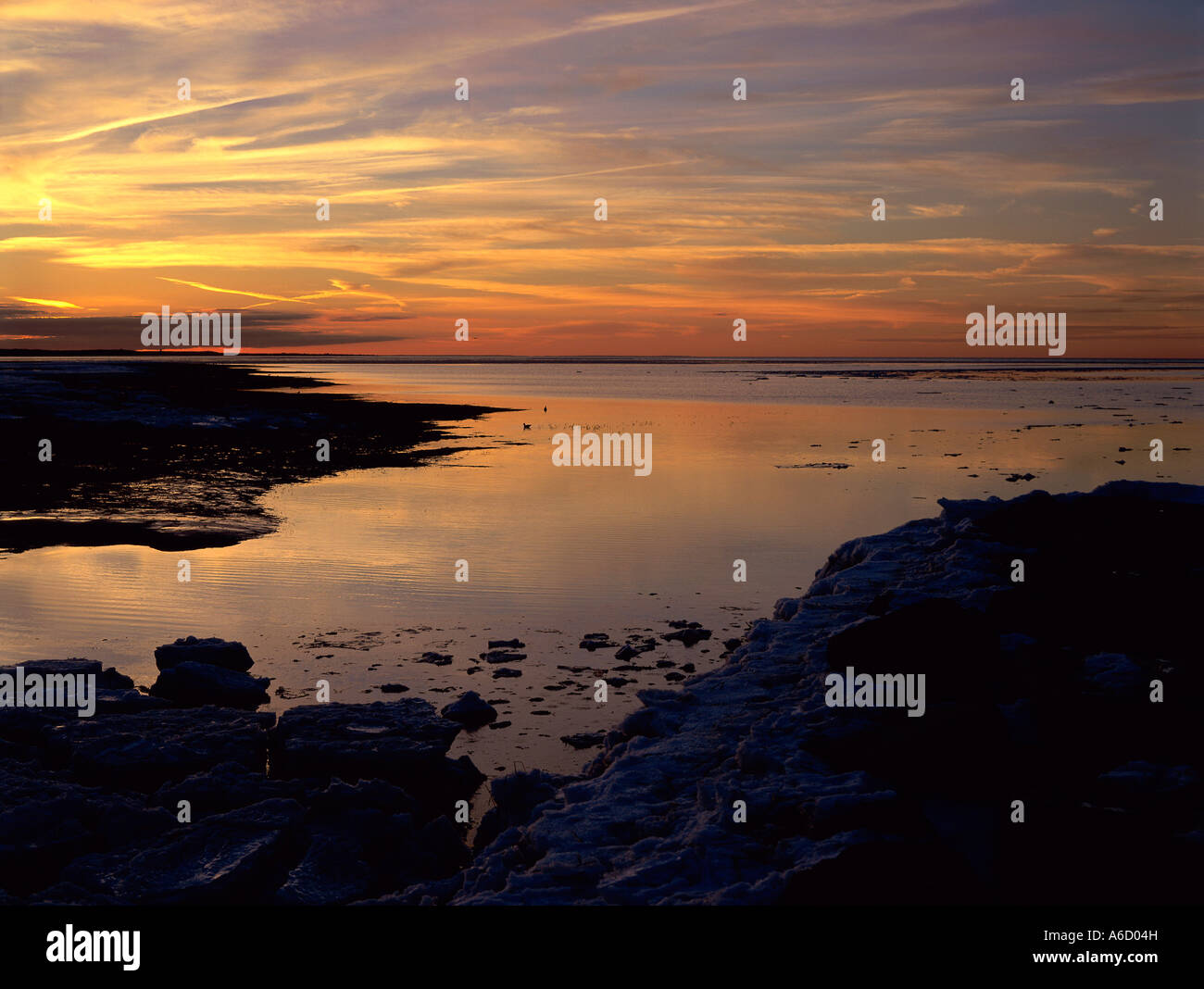 Sunset over the ocean Stock Photo - Alamy