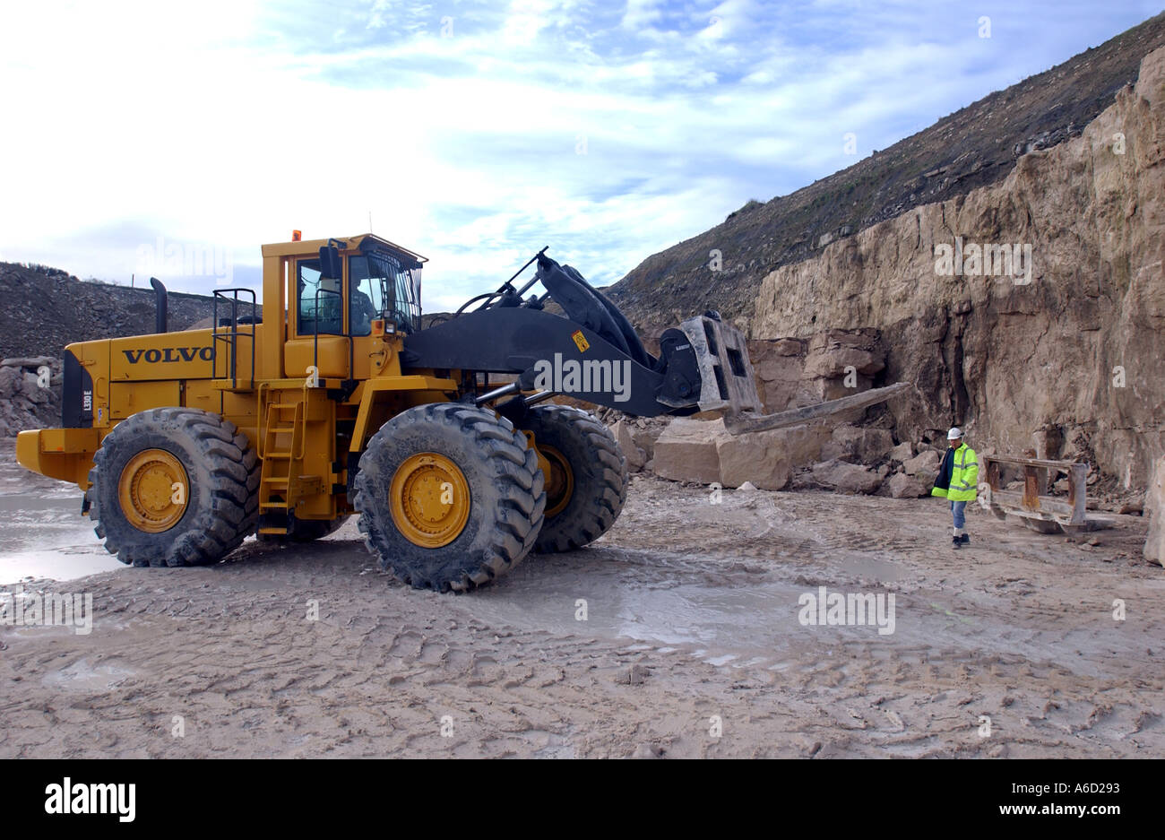 A 48 ton front loader at work in a Portland stone quarry in Dorset ...