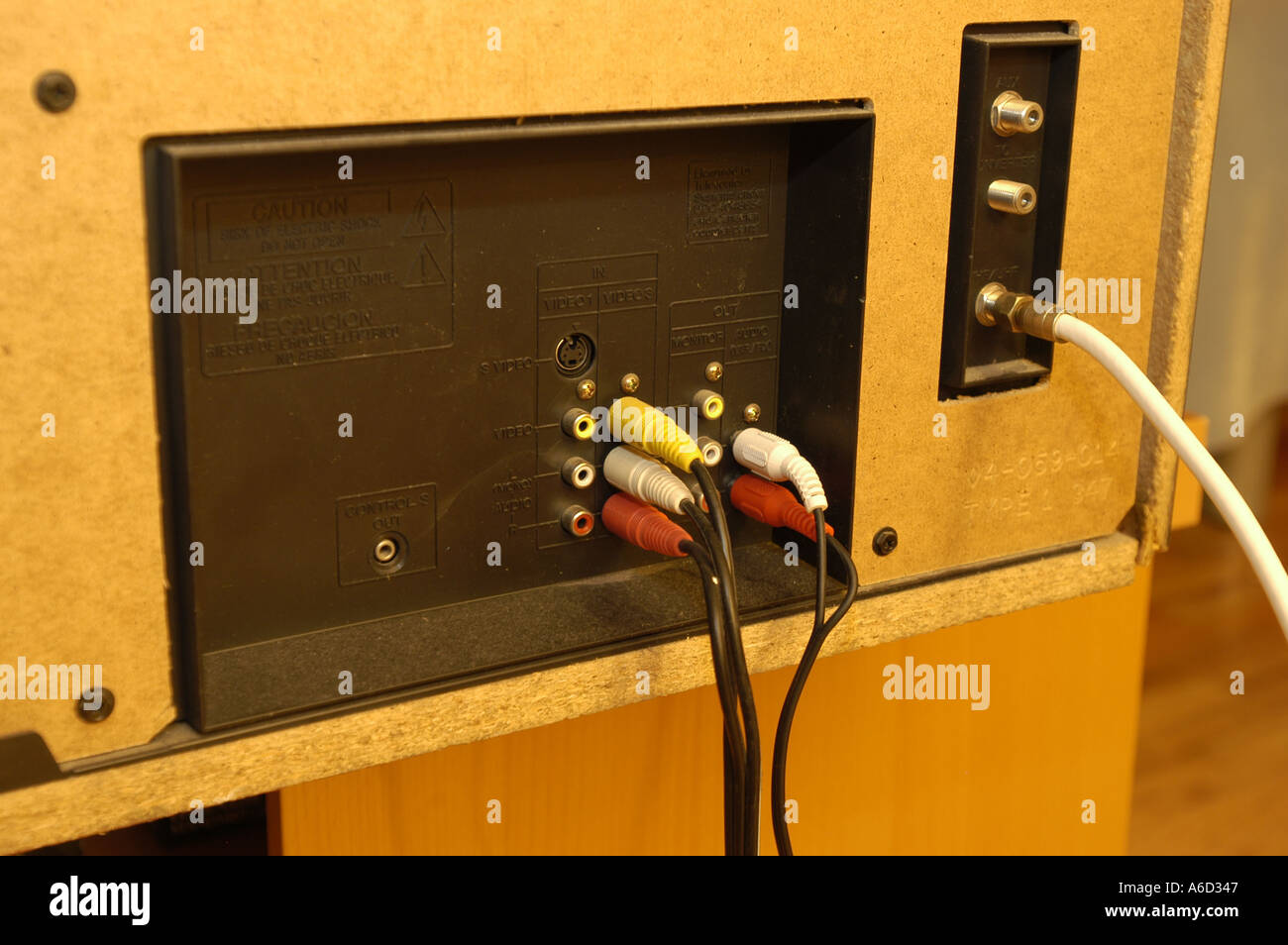 Tv cables behind a tv Big television Stock Photo - Alamy