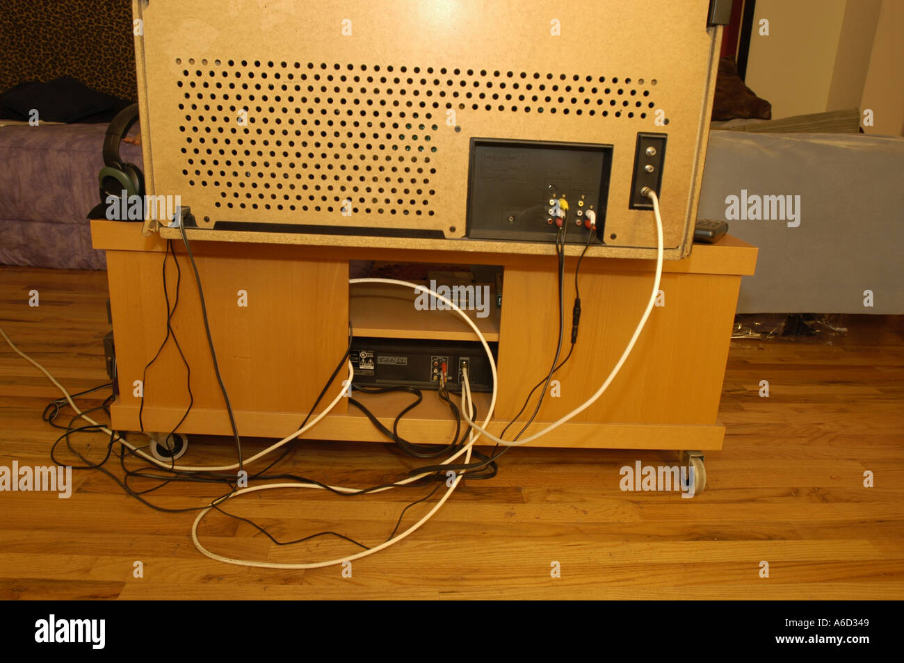 Tv cables behind a tv Big television Stock Photo - Alamy
