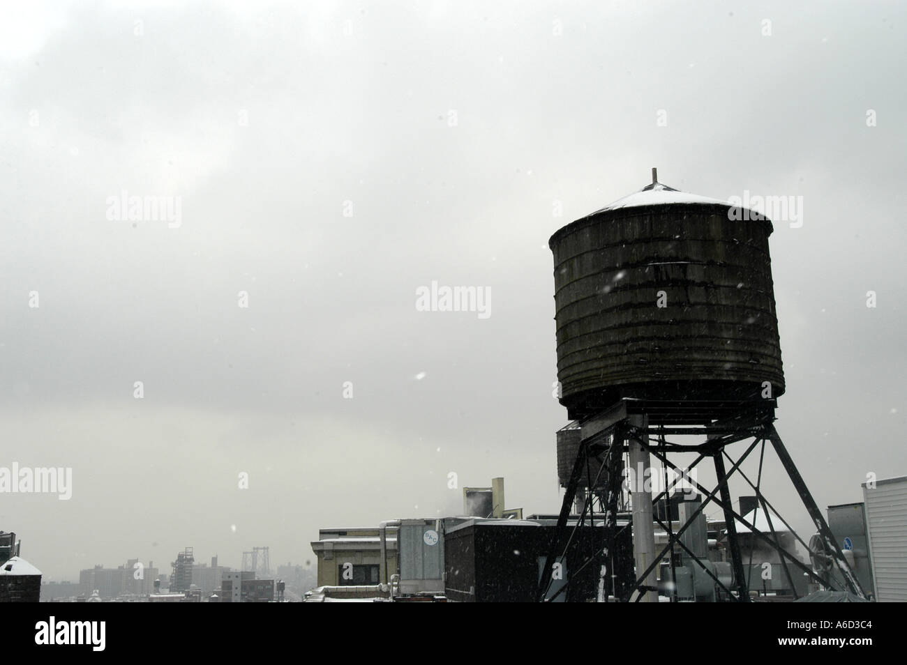 NY water tower winter snow horizontal Stock Photo - Alamy