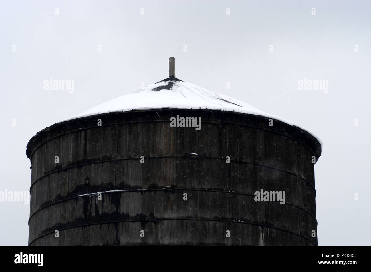 NY water tower tank snow winter horizontal Stock Photo - Alamy