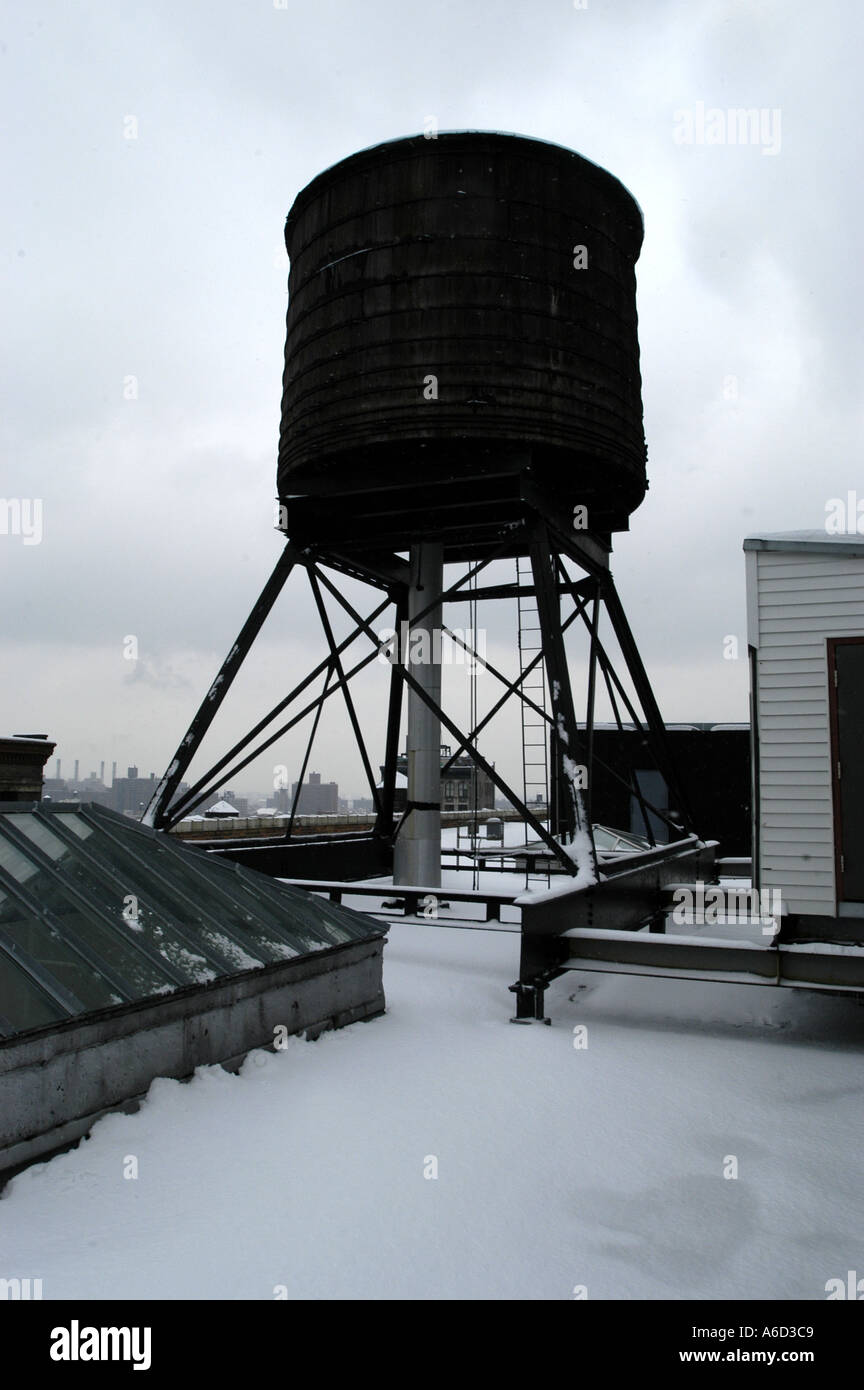 Water Tower roof tank snow vertical Stock Photo - Alamy