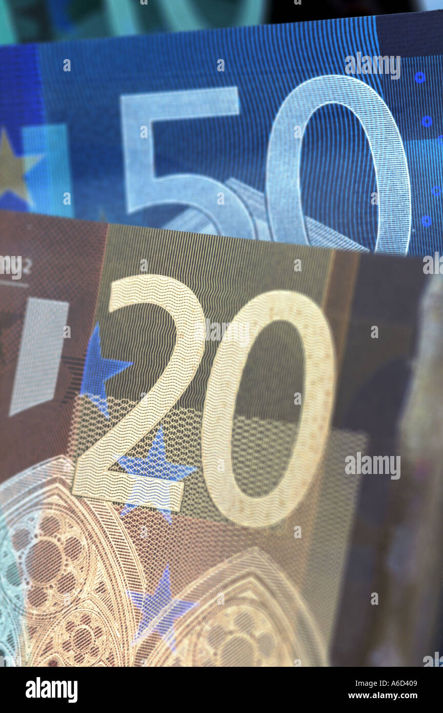 Euro bill laid out over a newspaper Stock Photo - Alamy