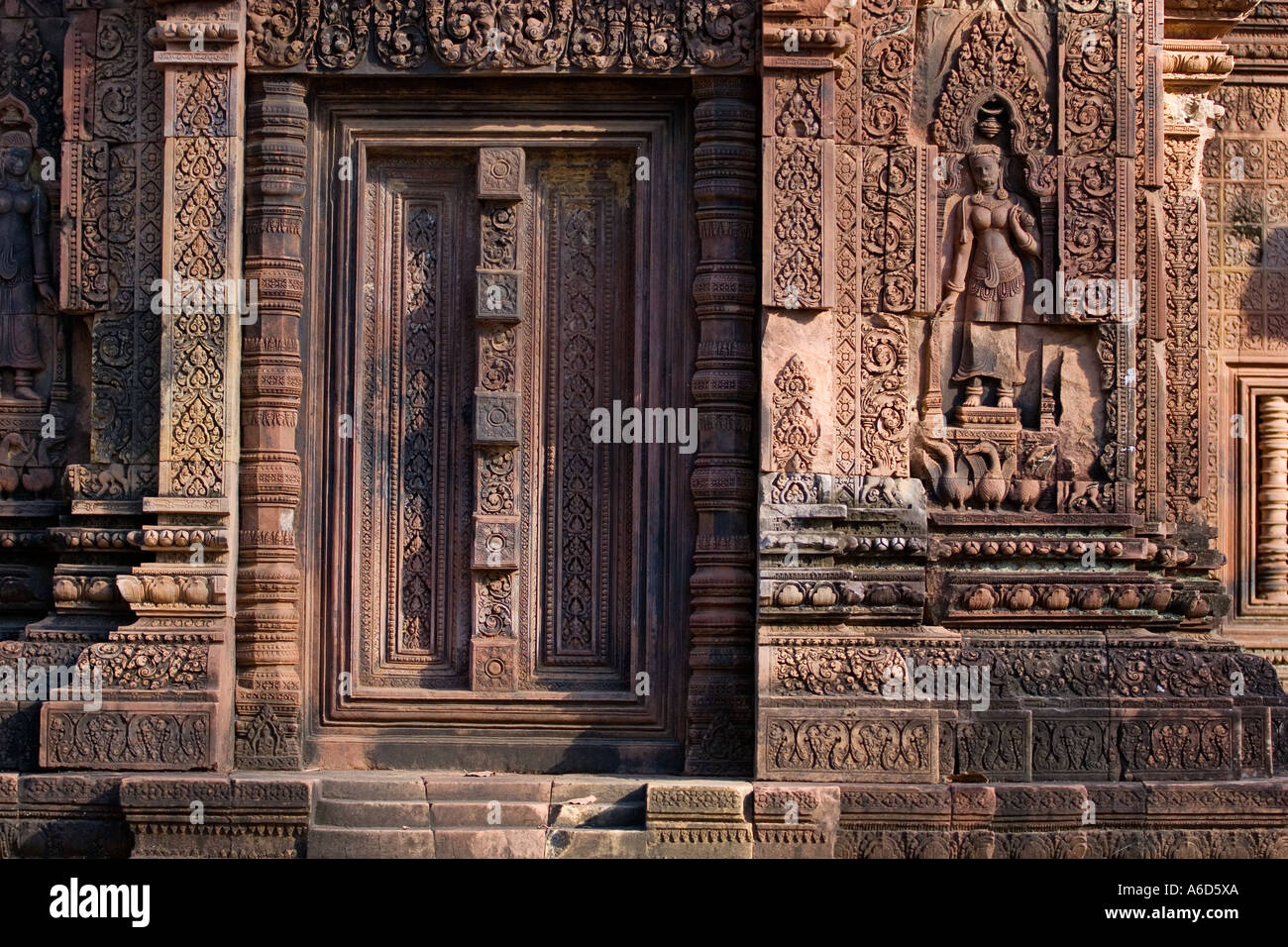 Hindu temple door with Apsara celestial maiden at Banteay Srei at ...