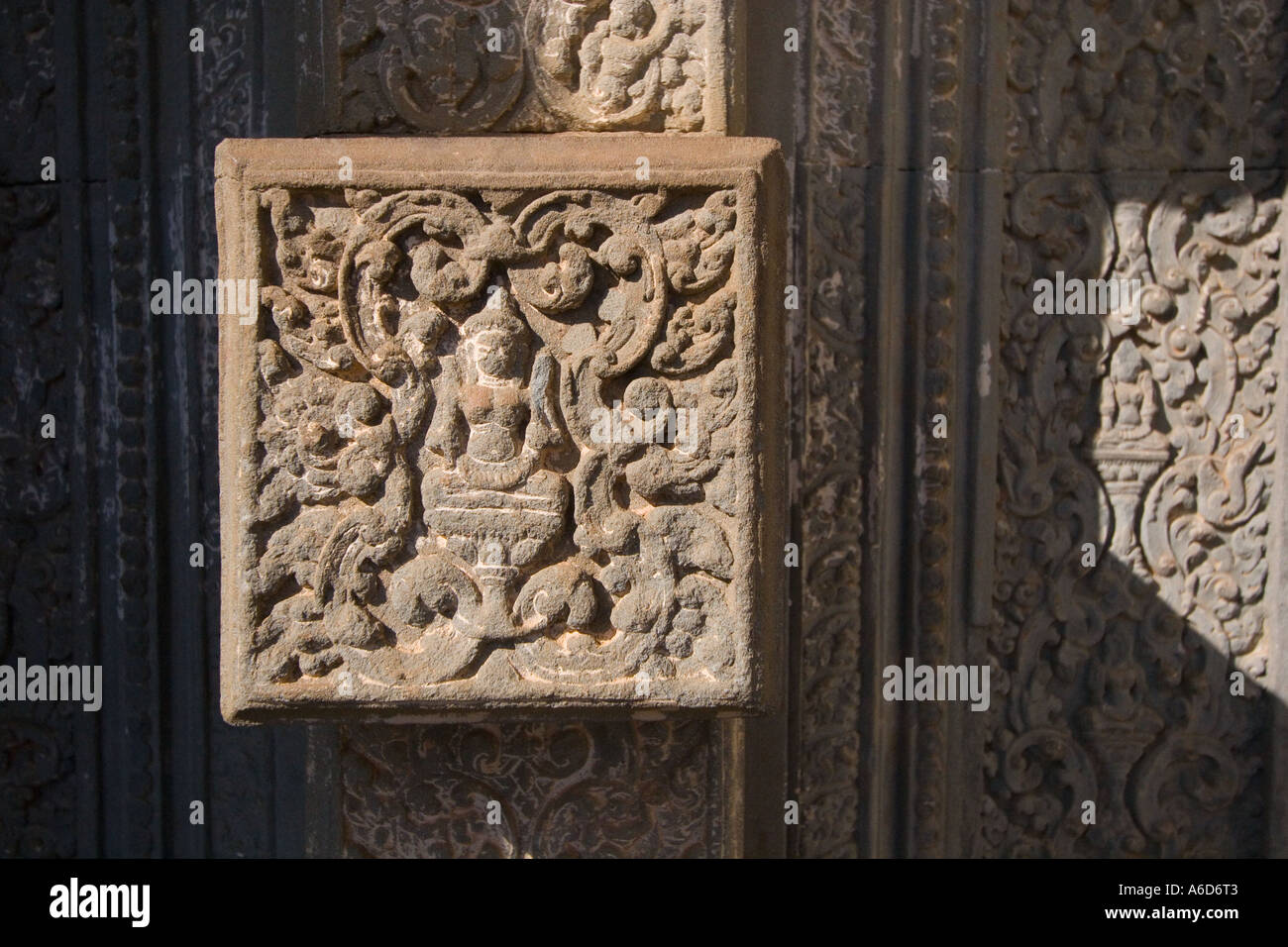 Detail of bas relief door with deity on a Hindu temple at East Mebon ...