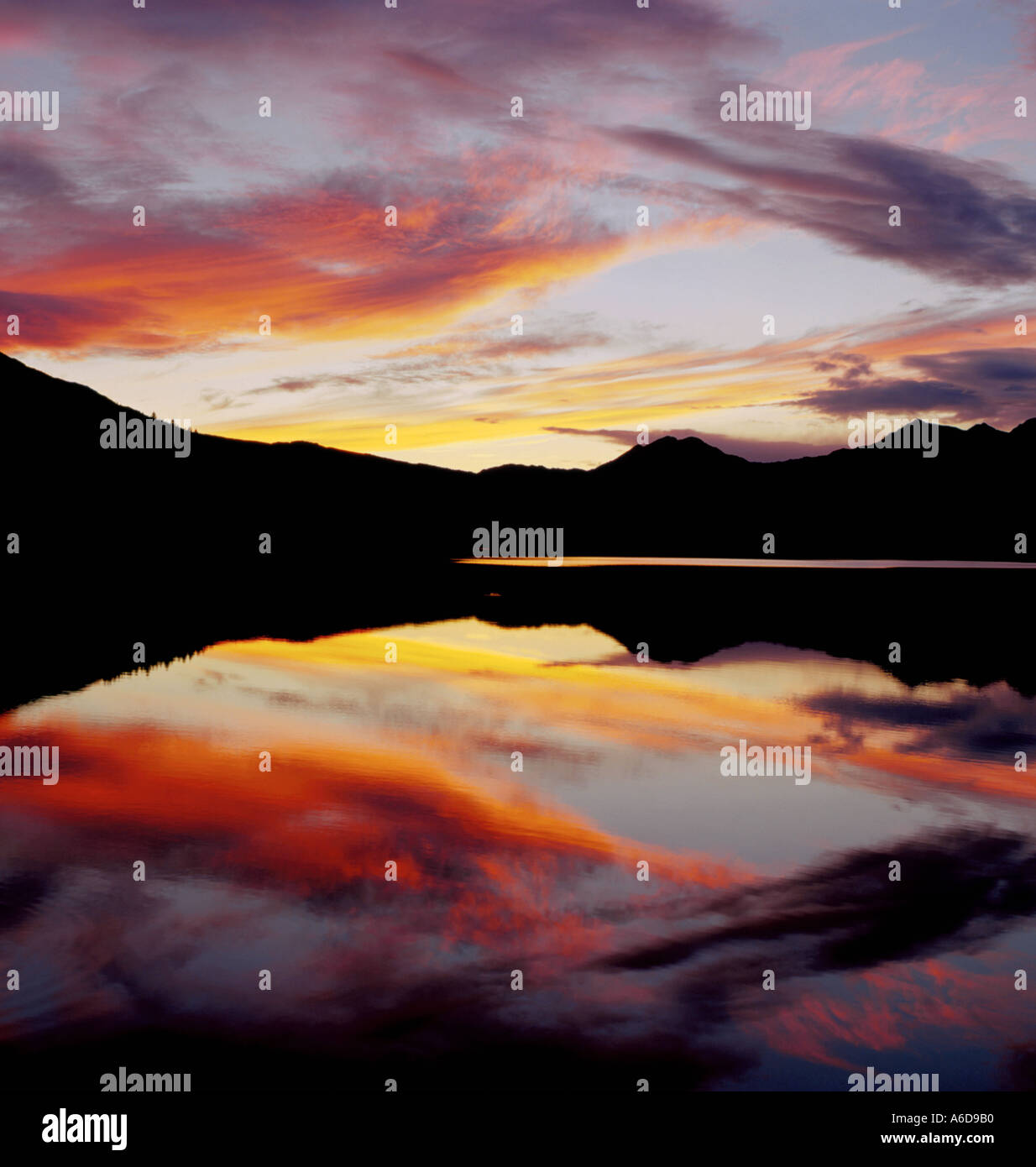 Dramatic mountain sunset seen over Snowdon (Yr Wyddfa) and Lynnau Mymbr ...