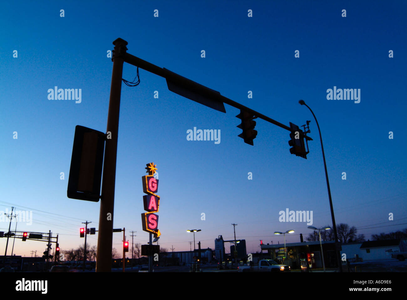 Traffic intersection and gas station sign Stock Photo - Alamy